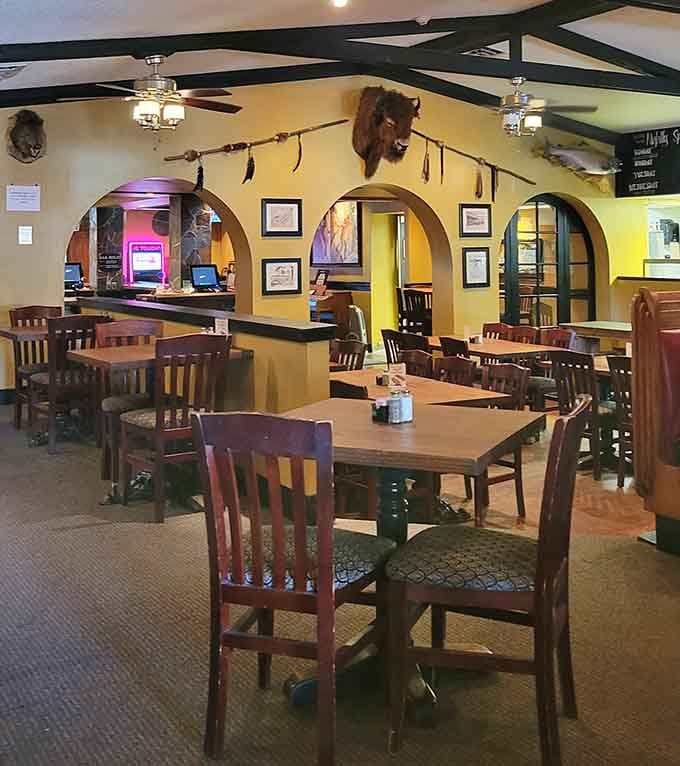 Those arched doorways and warm yellow walls create an atmosphere that feels both historic and welcoming at once.