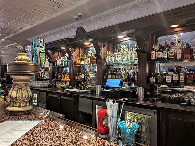 A well-stocked bar where the bottles gleam like treasures and the bartender knows exactly what you need today.
