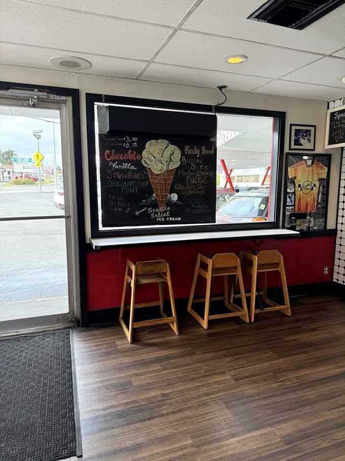 High-top seating by the window offers prime real estate for burger consumption and people-watching in equal measure.