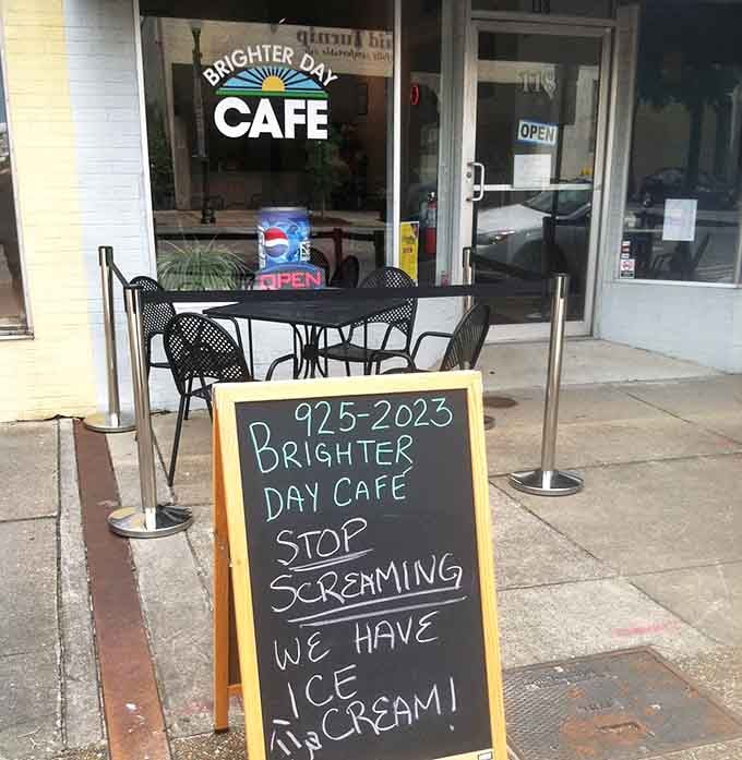 Even the sidewalk sign has personality here, promising ice cream with the kind of humor that makes you smile.