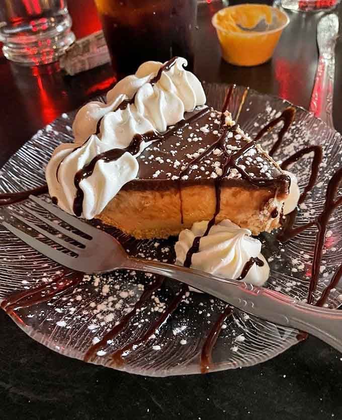 Chocolate peanut butter pie topped with whipped cream rosettes, because you absolutely saved room for dessert after all.