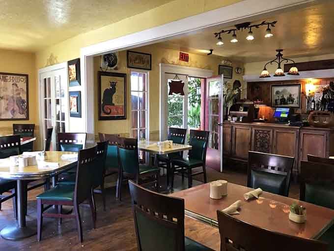 More golden walls and classic artwork remind you that sometimes the best restaurants feel like someone's beloved home.