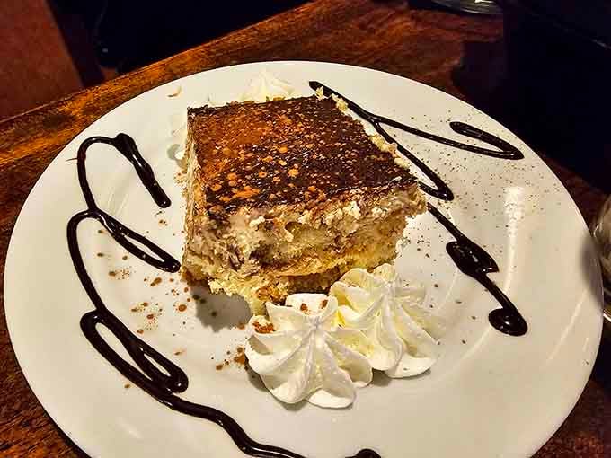 Tiramisu with that artistic chocolate drizzle shows the kind of attention to detail that separates good restaurants from great ones.