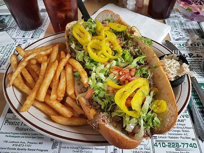 This cheesesteak is loaded so high with toppings, you'll need an engineering degree to eat it properly.