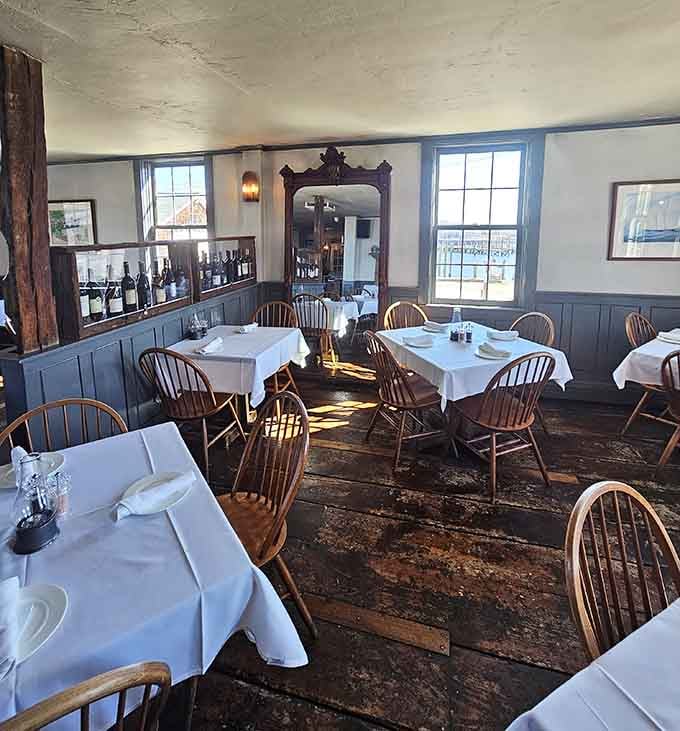 Sunlight streams through colonial windows onto tables set with crisp linens, creating an ambiance worthy of special celebrations.