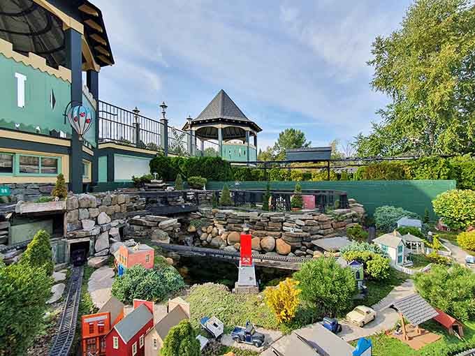 Miniature trains wind through tiny villages, delighting everyone who secretly still loves playing with model railroads.