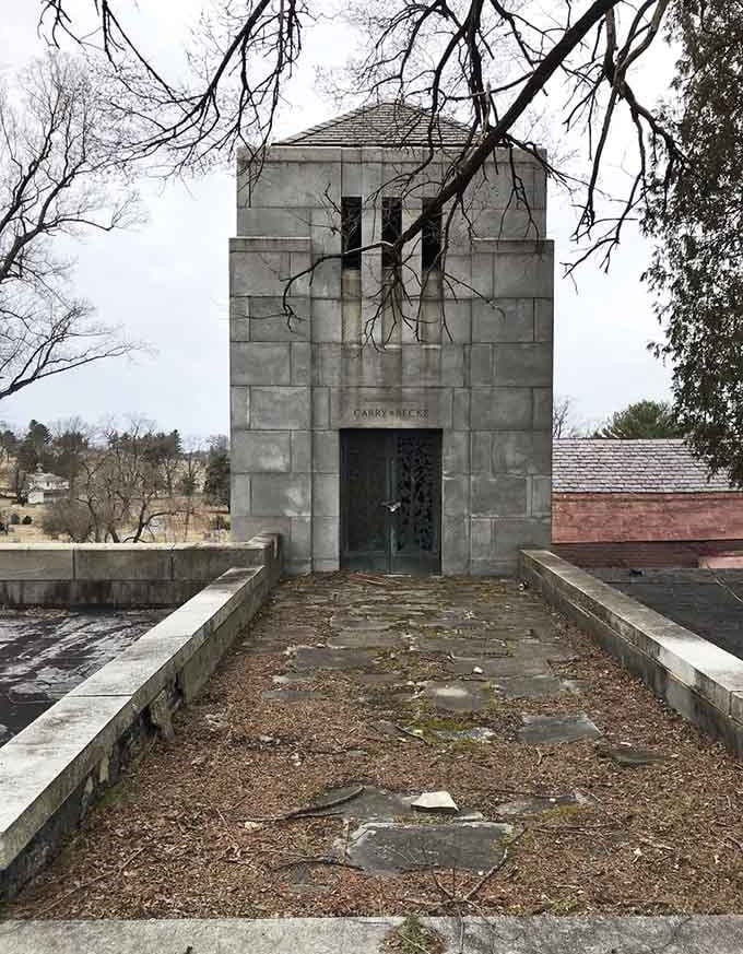 The stark geometry of this rooftop mausoleum commands attention, blending classical design with modernist sensibility perfectly.