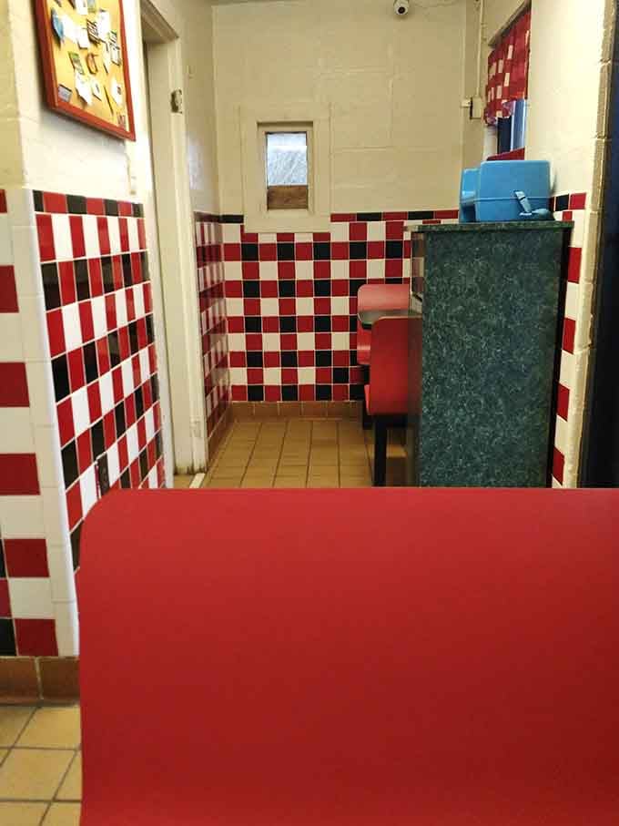 More red and white checkered goodness creating that classic pizzeria atmosphere that never goes out of style.