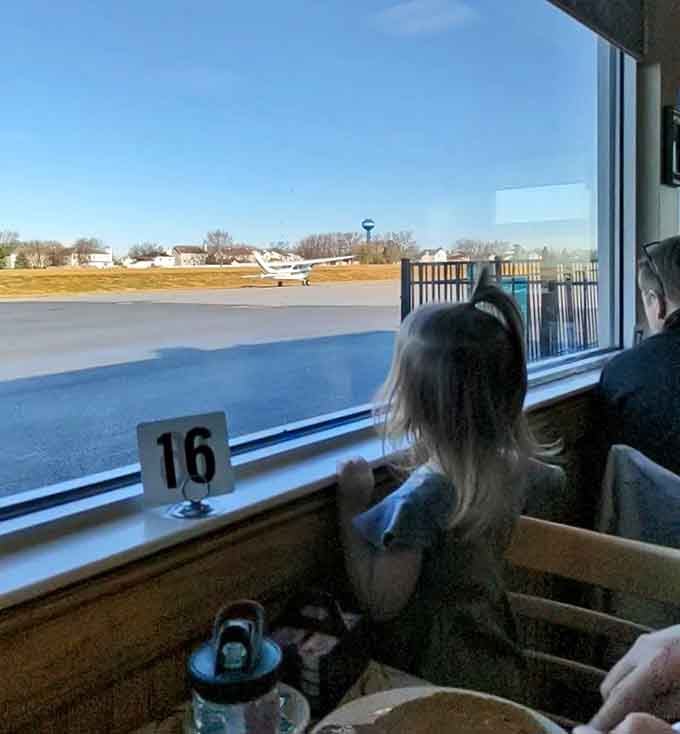 When your dining companion is a taxiing aircraft, you know breakfast just got infinitely more interesting than usual.