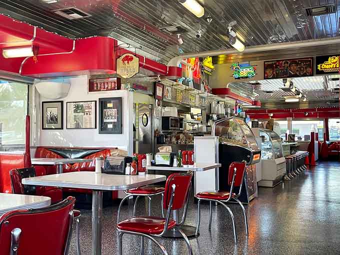 Chrome ceiling, neon glow, and enough nostalgic charm to make you forget what year it actually is.