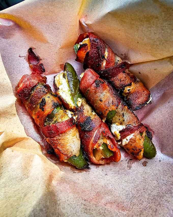 Bacon-wrapped jalape&ntilde;o poppers that deliver the perfect balance of heat, smoke, and "why didn't I order two servings" regret.