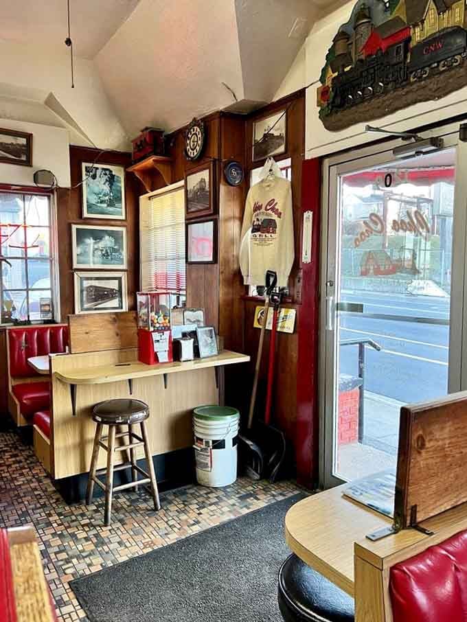 Every inch of wall space celebrates railroad history, making your meal feel like dining in a beloved museum.