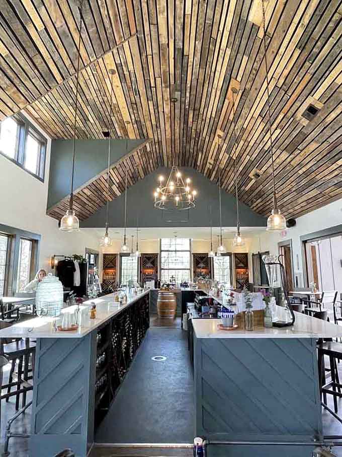 That bar ceiling alone is worth the trip, looking like a rustic cathedral dedicated to the wine gods.