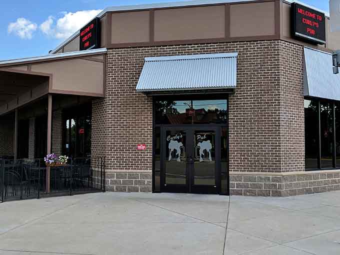 Modern brick construction meets small-town dining where locals gather for meals that don't require a reservation three weeks out.
