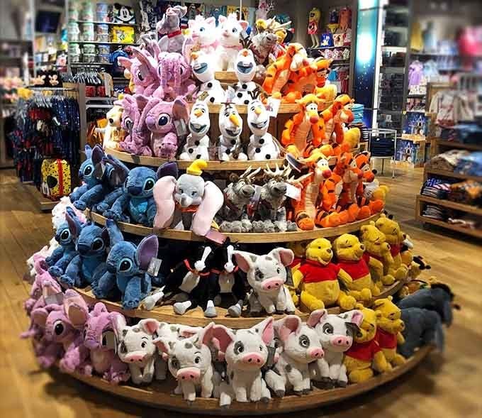 This plush tower of Disney characters looks like childhood memories stacked into one irresistible pyramid of joy.