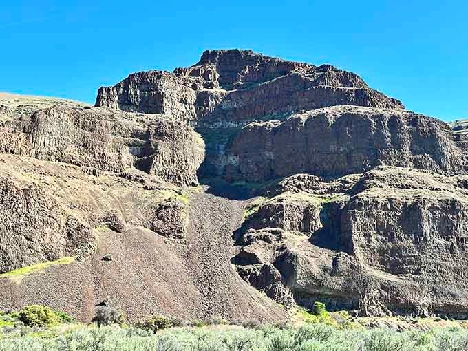 Layered basalt formations tell geological stories millions of years old, creating natural architecture that no human could ever replicate or improve.