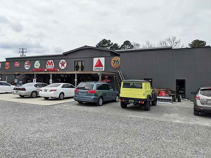 Vintage gas station signs cover the exterior like badges of honor from America's roadside glory days.