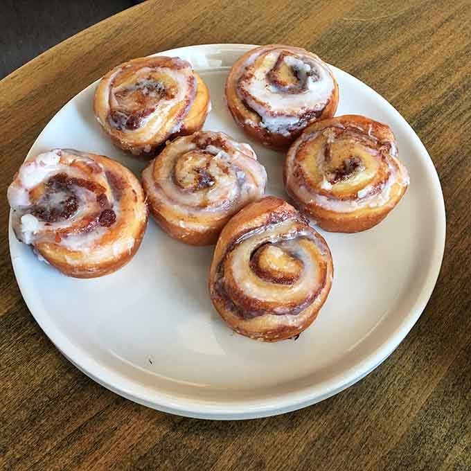 Cinnamon rolls with icing that proves some mornings are worth getting out of bed for, friends.