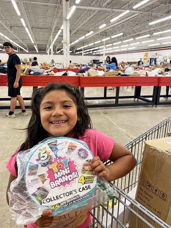 Pure joy captured in a smile&mdash;finding the perfect toy at an unbeatable price is what childhood memories are made of.