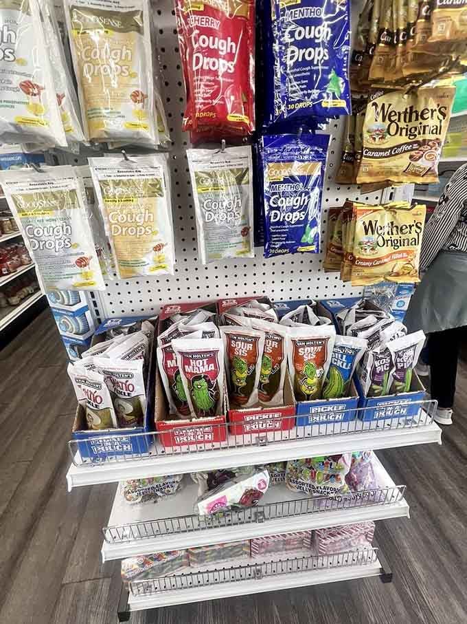Cough drops and candy sharing shelf space, the sweet and the medicinal living in perfect retail harmony.