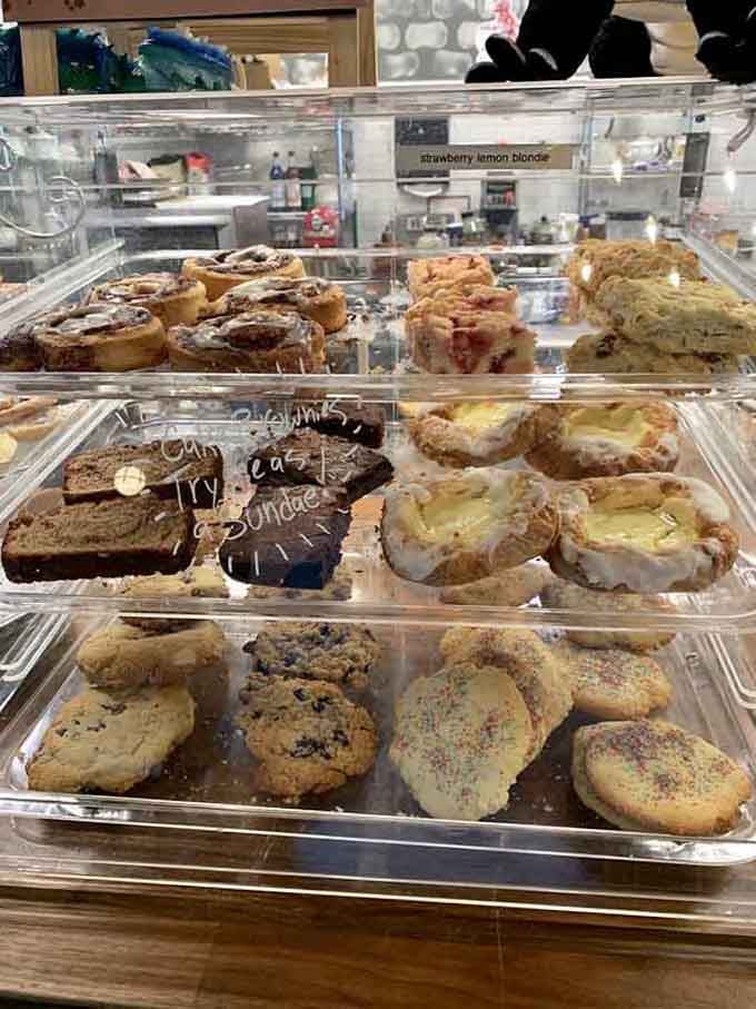 A bakery case filled with cookies, brownies, and pastries that would tempt even the most disciplined dragon slayer.