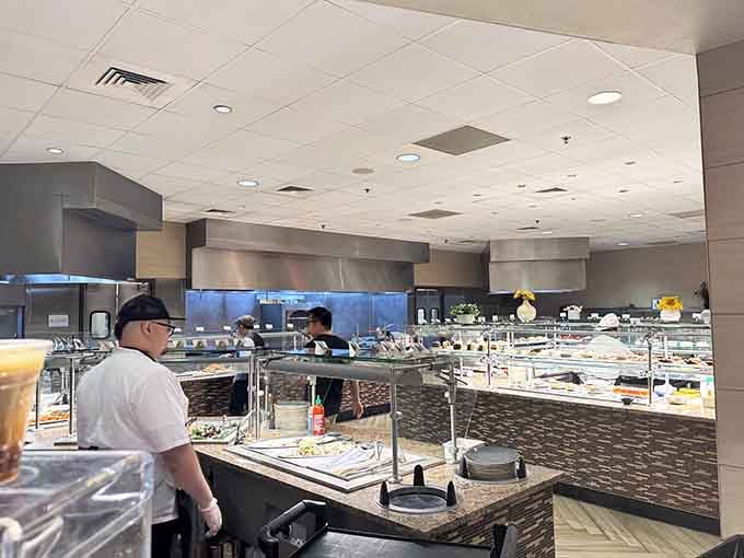 The buffet stations stretch endlessly, offering more choices than your indecisive brain can reasonably process at once.