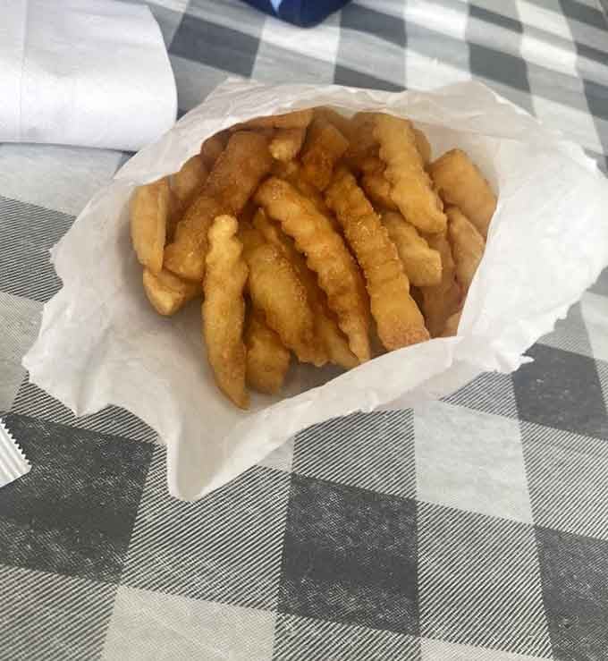 Crinkle-cut fries served hot and crispy, because some traditions are too good to mess with.