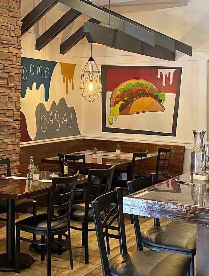 Playful murals declaring "come casa" remind you that great food should always feel like coming home to something wonderful.