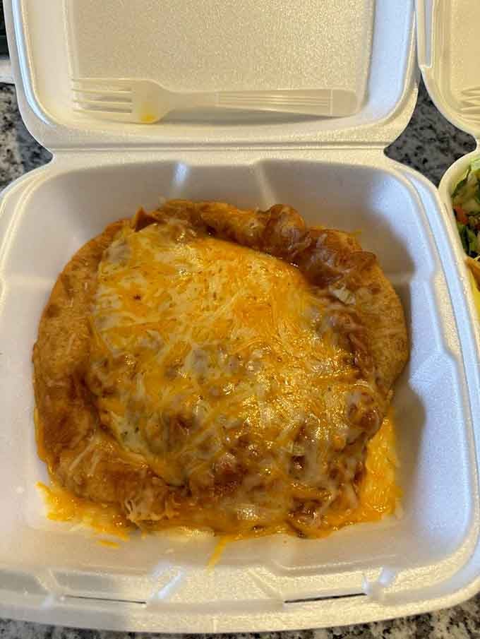 Fry bread topped with beans and melted cheese&mdash;comfort food that gives you a warm hug from the inside.