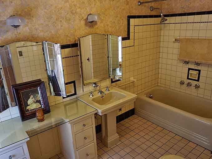 The vintage bathroom proves that even plumbing can be elegant when you put some thought into it.