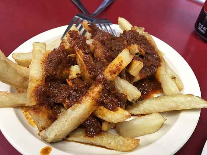 French fries getting the full meat sauce treatment transforms a simple side into something that deserves its own fan club.