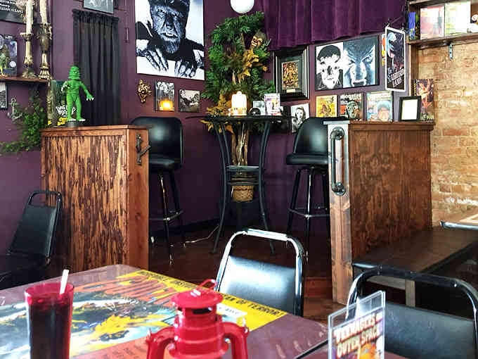 Purple walls and vintage treasures create an atmosphere that's equal parts museum and mealtime magic.