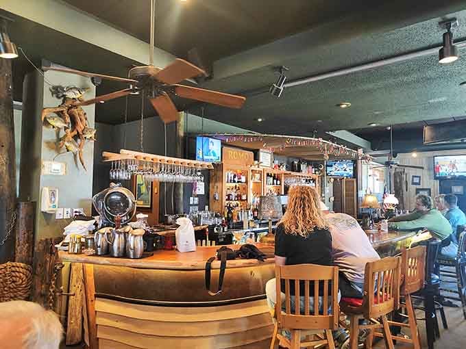 The curved bar with its nautical touches invites you to settle in with a cold drink while soaking up the atmosphere.