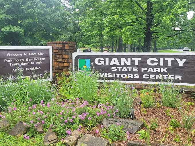The visitor center entrance blooms with springtime color, inviting you to discover what lies beyond those welcoming doors.