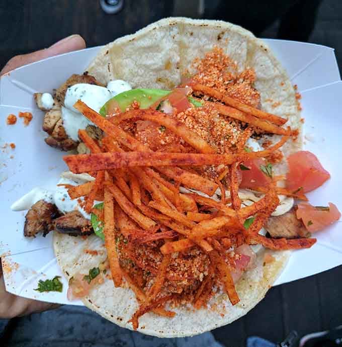 Crispy carrot strings top these tacos in a presentation that's Instagram-ready yet authentically delicious where it counts.