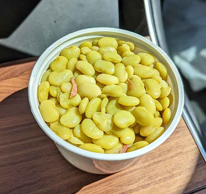 Butter beans cooked Southern style, tender and flavorful, proving vegetables can absolutely hold their own alongside legendary barbecue.