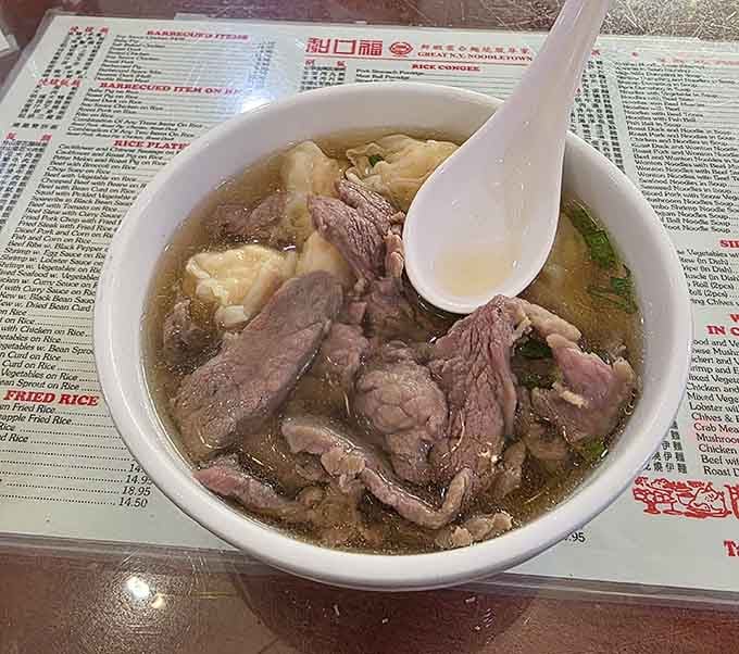 Tender beef and delicate wontons swimming in broth that could cure whatever ails you, guaranteed.