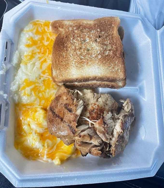 Grilled chicken breast with scrambled eggs and toast proves lunch items work beautifully at breakfast time too.