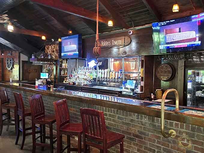 The bar at Hall's Tavern offers the perfect spot to relax with a cold drink before your feast arrives.