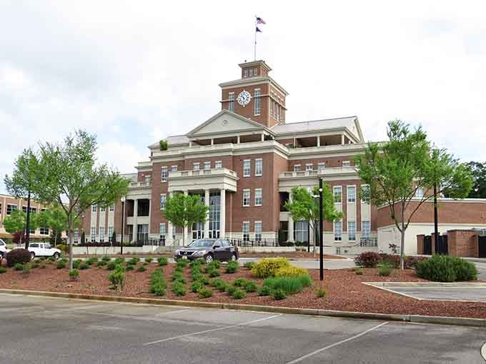 The modern Municipal Center proves life continues here, though calling this collection of buildings a thriving metropolis requires generous imagination.