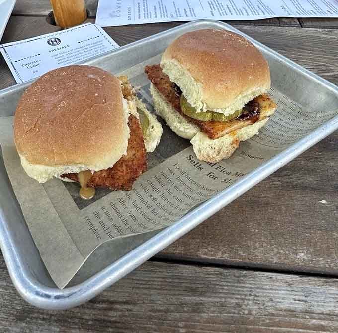 Two perfectly bronzed sliders on soft buns represent everything wonderful about keeping things simple and satisfying at lunchtime.