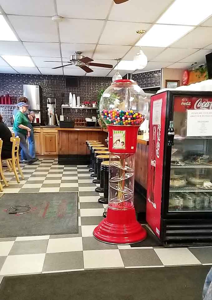 That vintage jukebox and gumball machine add nostalgic charm that modern restaurants spend fortunes trying to fake unsuccessfully.