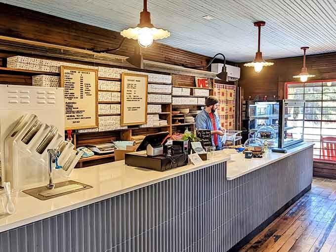 The counter where magic happens, staffed by folks who understand that good coffee requires proper respect and equipment.
