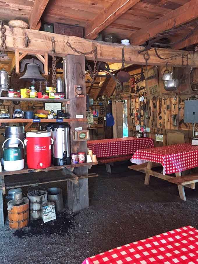 Antique tools and farm implements decorating the walls, turning breakfast into a rustic museum experience.