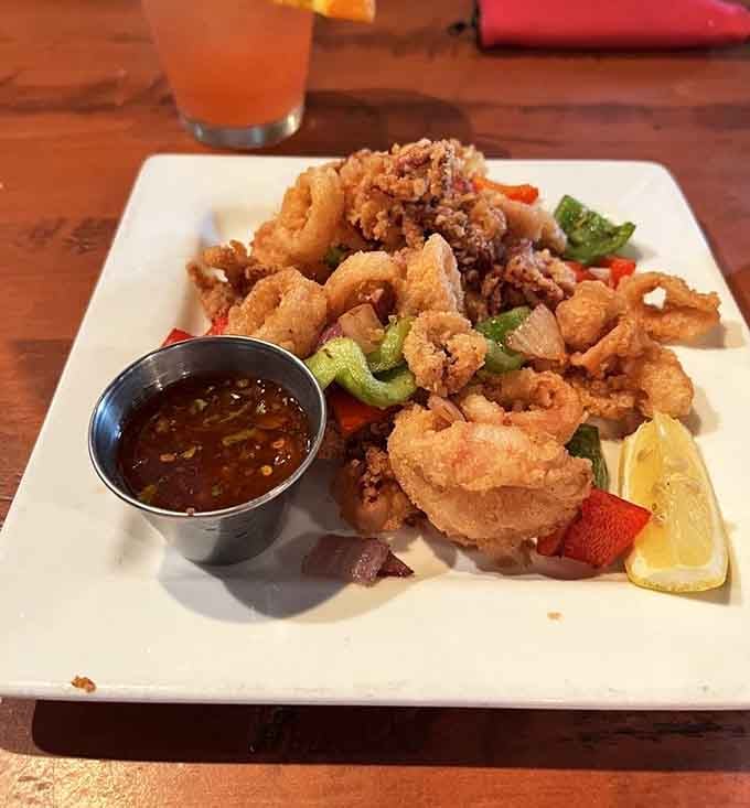 Crispy calamari that's golden, tender, and proof that even steakhouses know how to handle seafood with respect.