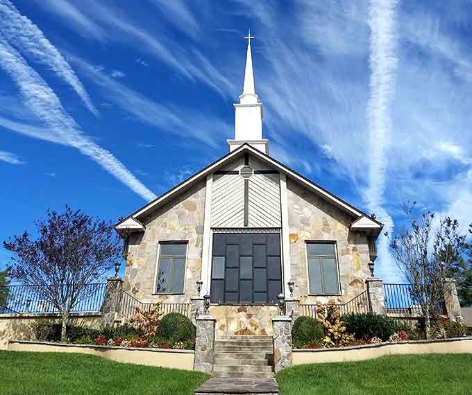 First Baptist Church's stone facade and mountain backdrop create postcard perfection that transcends any denomination.