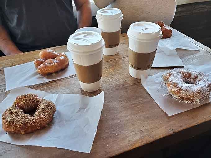 The perfect breakfast tableau: donuts and coffee arranged like a still life painting you're about to devour.