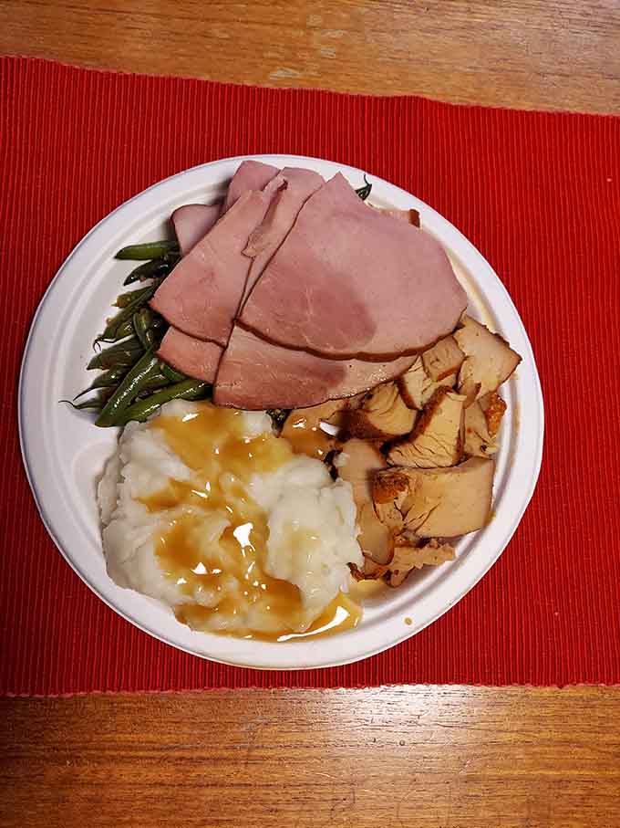 Thick-sliced smoked ham and turkey with gravy-drizzled potatoes and green beans make Sunday dinner look like child's play.