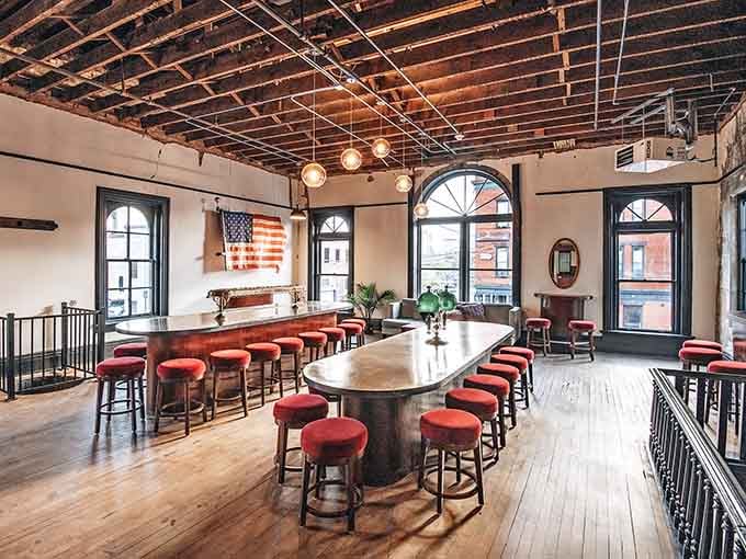 Arched windows and exposed copper ceiling create an atmosphere reminiscent of a 1940s supper club reimagined for modern brunch lovers.