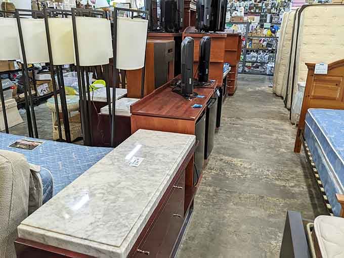 Furniture fills every corner, transforming empty apartments into homes without requiring a bank loan application.